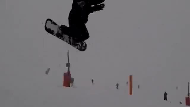 Snowboarder Jumps and Crashes down on Slope | Jukin Licensing