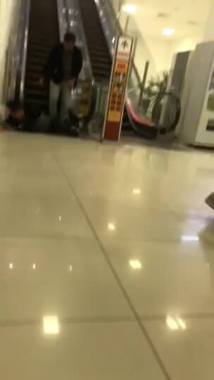 Guy Tries to Jump Over Escalator Rail | Jukin Licensing