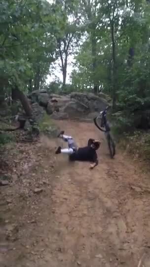 Mountain Biker Faceplants off Rocky Forest Drop | Jukin Licensing