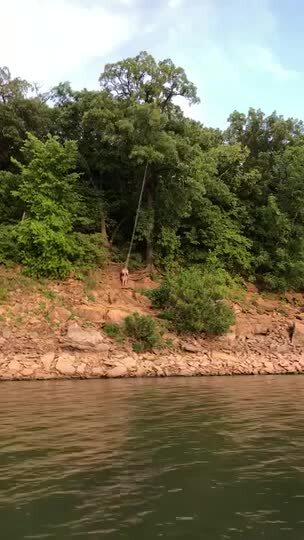 Woman Tumbles off Cliffside Rope Swing Into Lake | Jukin Licensing