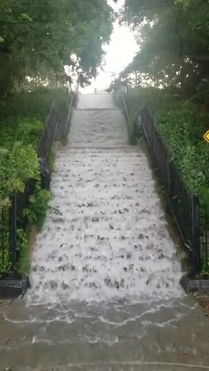 Heavy Rain Creates Waterfall on Staircase | Jukin Licensing
