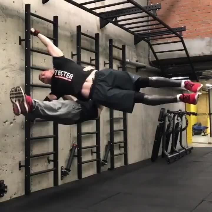 Two Men Complete Impressive Human Flag Stunt | Jukin Licensing