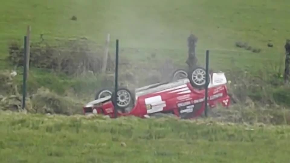 Red Rally Car Flips on Track | Jukin Licensing