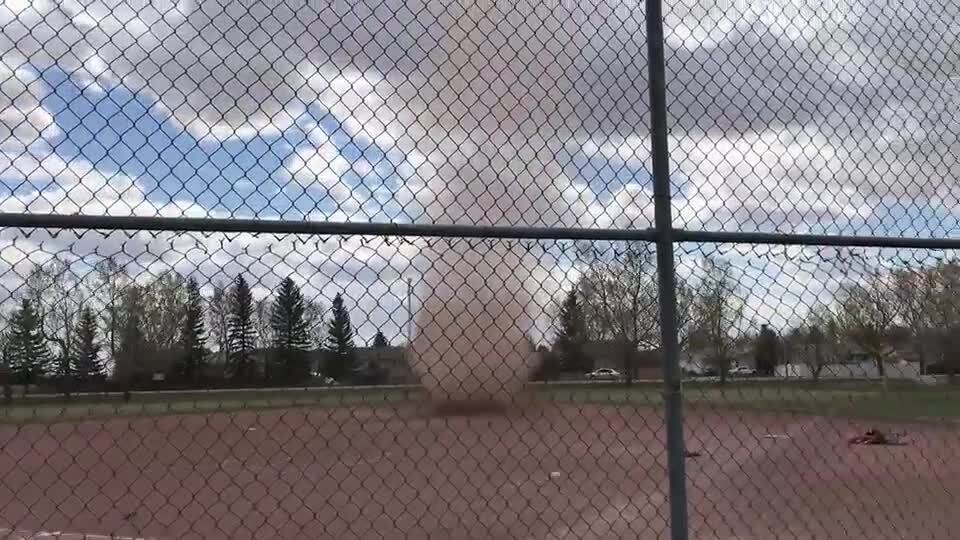 Dust Devil Plows Through Spectators at Softball Game | Jukin Licensing