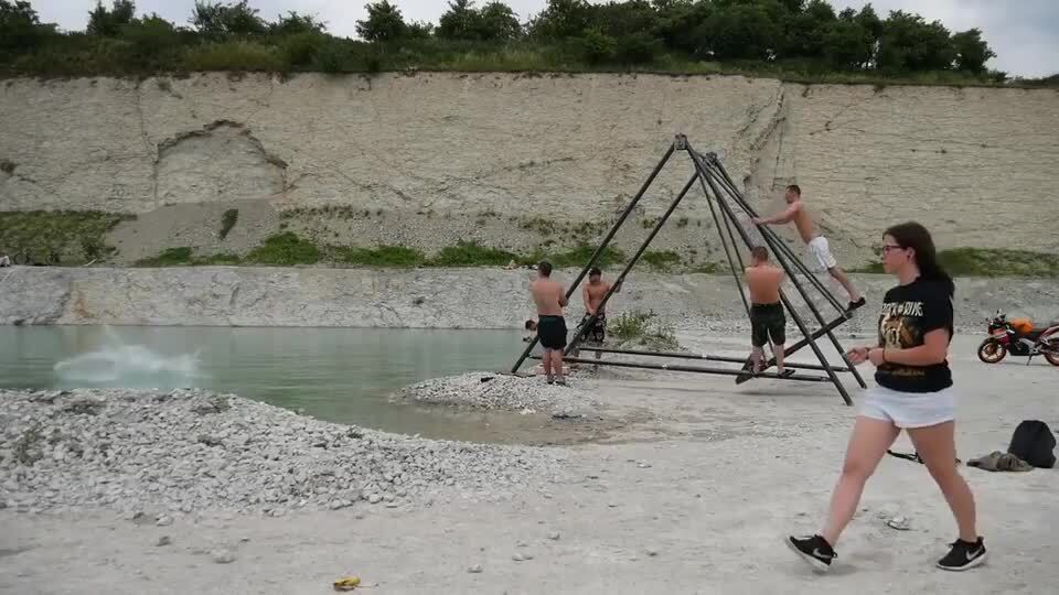Guys Dive into Water at Rock Quarry | Jukin Licensing