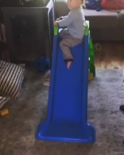 Dad Saves Kid from Falling off Slide | Jukin Licensing