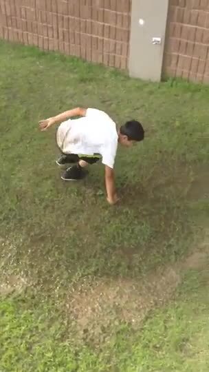 Kid Jumps off Ledge and Falls in Puddle | Jukin Licensing