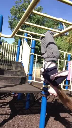 Girl Falls off Monkey Bars while Trying to Do Crunches | Jukin Licensing