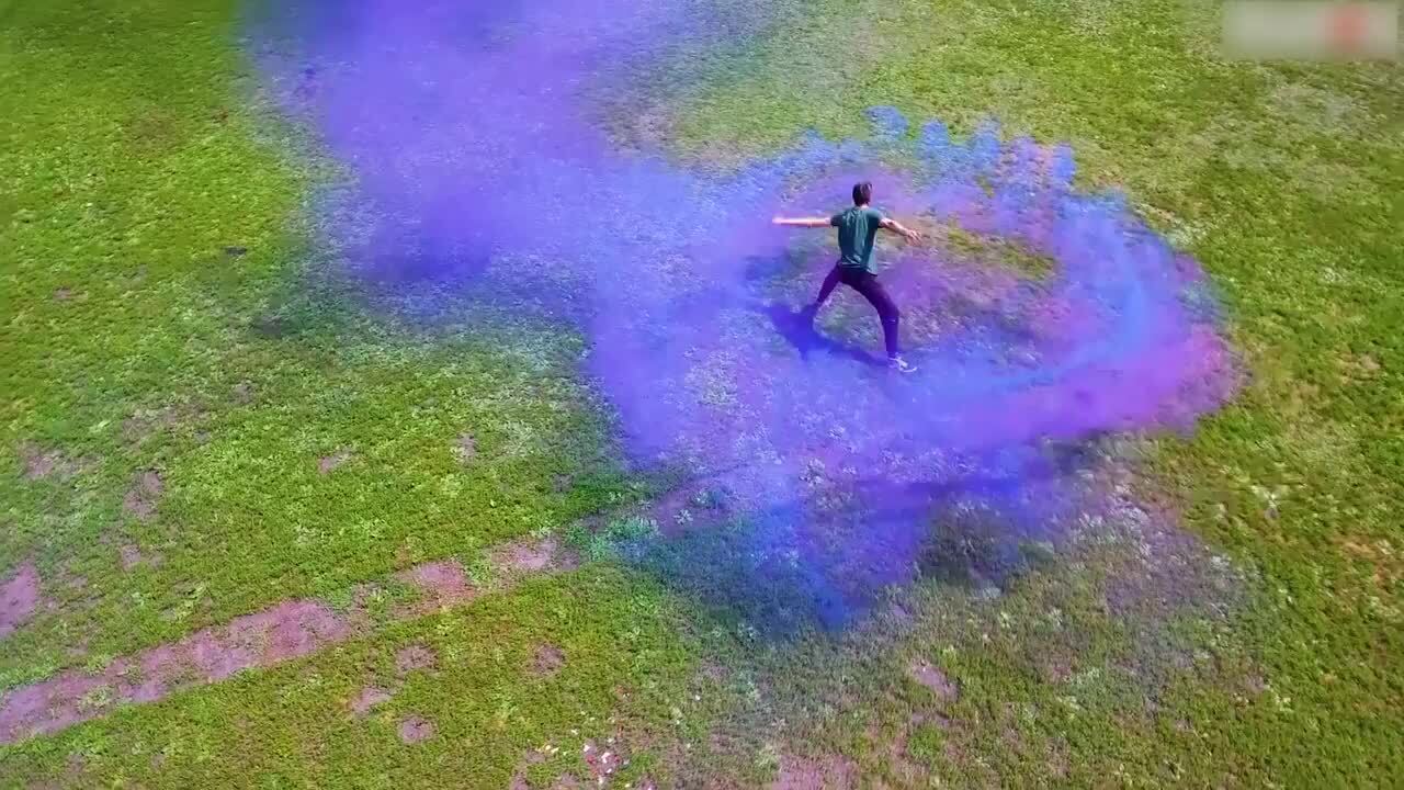 Artist Performs Colored Smoke Trick Using Smokestack Props And Leviwand ...