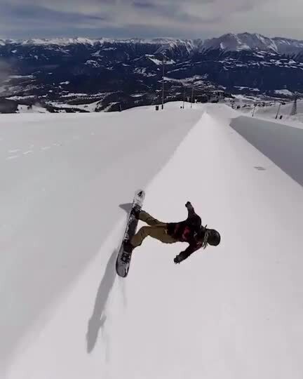 Guy Does Snowboarding Tricks on Snow Ramp | Jukin Licensing