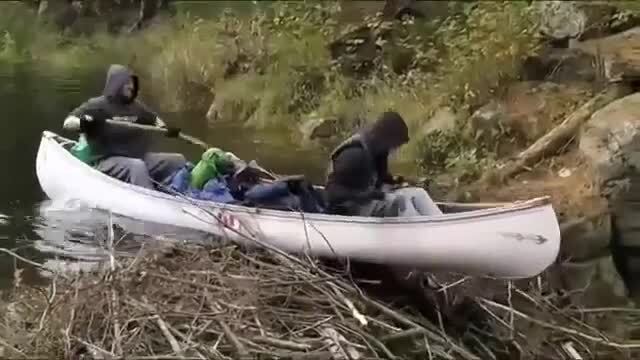 Friends Almost Capsize Canoe over Dam | Jukin Licensing