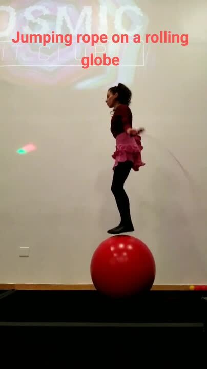 Woman Shows Amazing Balancing Skills While Skipping On Rolling Globe ...