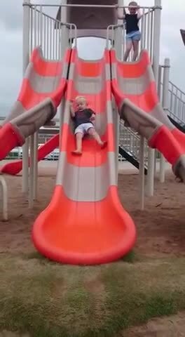 Little Kid Wobbles Down Playground Slide | Jukin Licensing