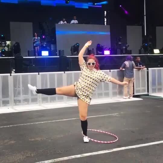 Woman Does Hula Hoop Tricks at Outdoor Concert | Jukin Licensing