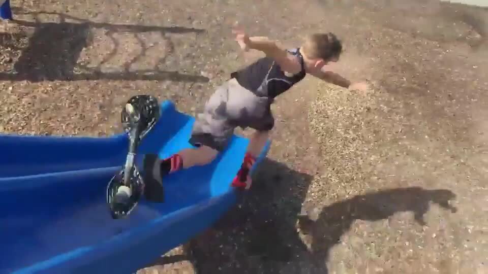 Kid Faceplants After Attempting to Ride Caster Board Down Slide | Jukin ...