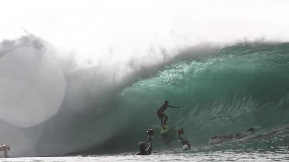 Surfer Rides Through Wave Pipeline | Jukin Licensing