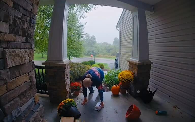 Woman Loses Footing and Falls Down on Front Porch | Jukin Licensing