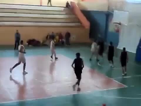 Basketball Players Collide and Fall on Court | Jukin Licensing