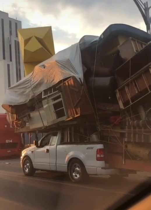 Loaded Mini Truck Helps in Moving Huge Pile of House Stuff | Jukin ...