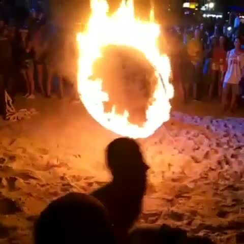 Girl Trips While Trying to Jump Through Flaming Hoop | Jukin Licensing