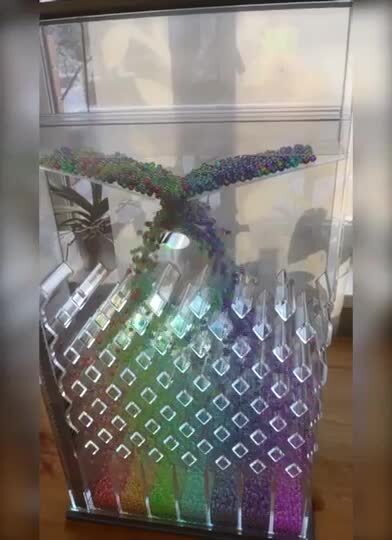 Colored Marbles Separate in Machine | Jukin Licensing