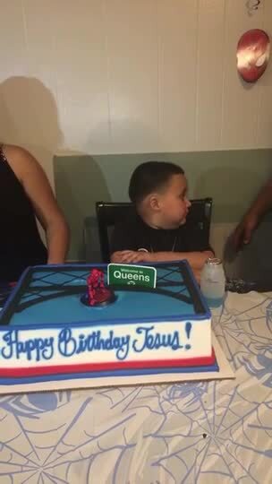 Kid Flips off Family After Someone Pushes Head Into Cake | Jukin Licensing