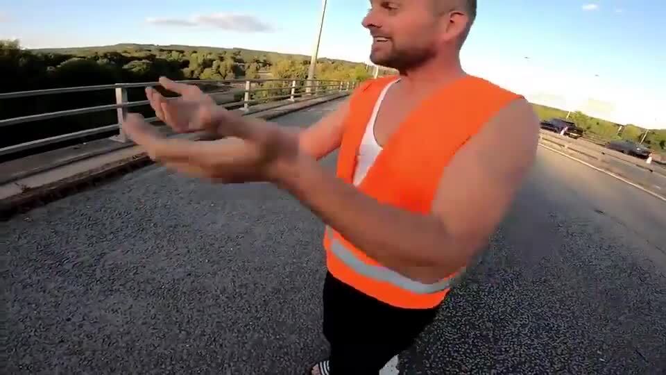 Guys Save Swan Stranded on Busy Motorway | Jukin Licensing