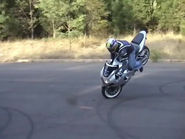 Motorcycle Stoppie Goes Crooked and Tips Over | Jukin Licensing