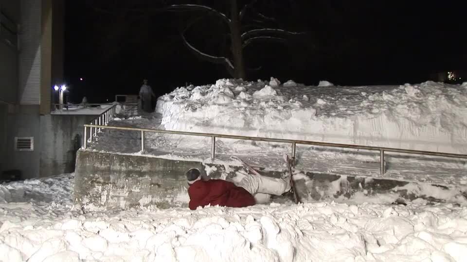 Frustrated Skier Throws Ski Poles After Falling off Handrail While ...