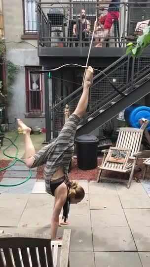 Contortionist Shoots Bow and Arrow With Feet | Jukin Licensing