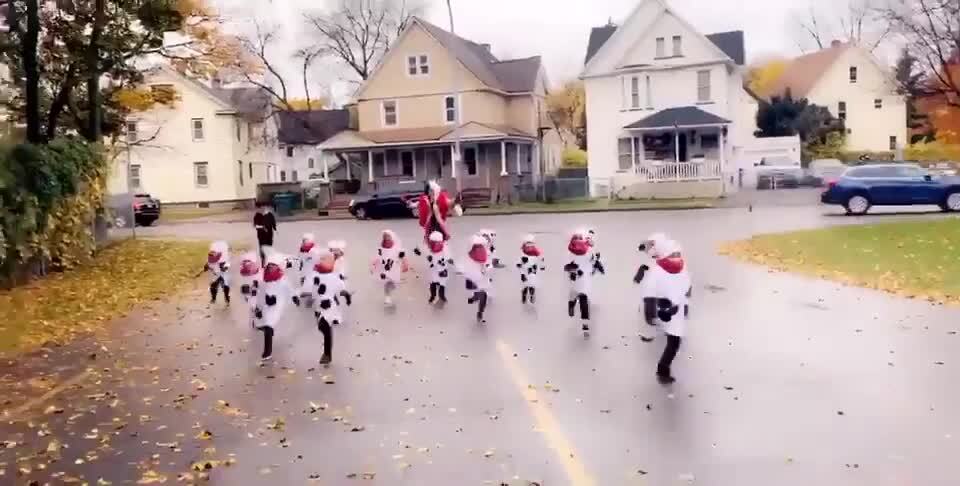 Kids and Teacher Run Down Street Dressed as Characters From Famous ...
