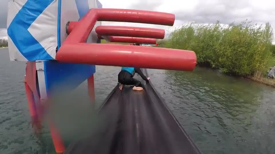 Guy Struggles to Get Through Obstacle Course Over Water | Jukin Licensing