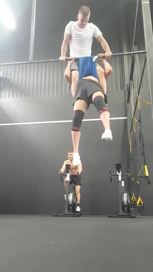 Guy's T-Shirt Gets Stuck on Pull up Bar While Exercising | Jukin Licensing