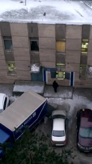 Delivery Driver Throws Packages into Truck | Jukin Licensing