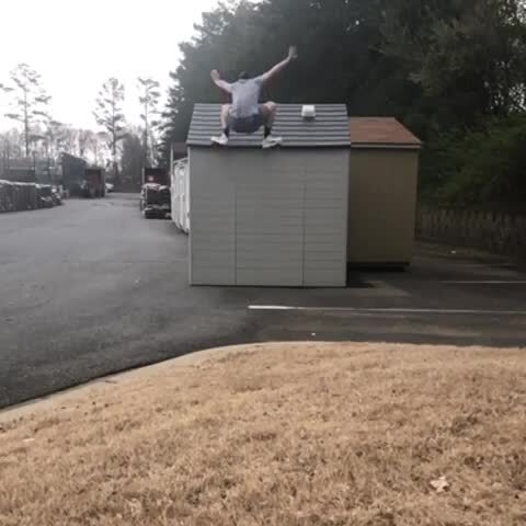 Guy Does Parkour Jump onto Slanted Roof on Shed | Jukin Licensing