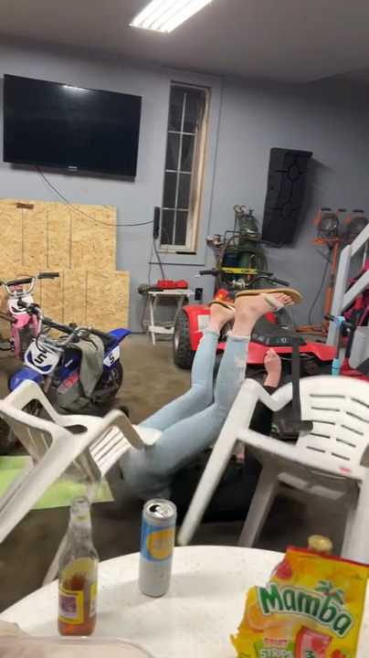 Woman Fall Off Chair While Working in Garage | Jukin Licensing