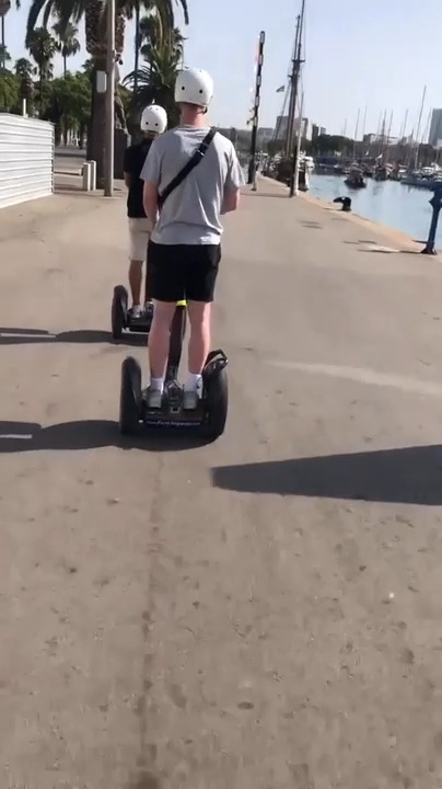 Guy Riding Segway Crashes Into Pole While Watching Fellow | Jukin Licensing