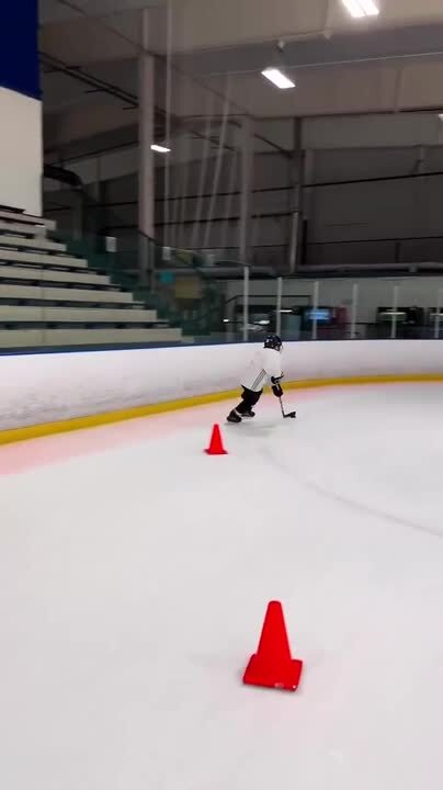 Ice Hockey Player Navigates Through Obstacle Course During Practice ...