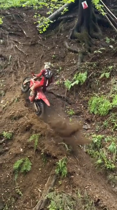 Person Falls Off Dirt Bike While Climbing Steep Hill | Jukin Licensing