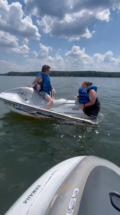 Scared Mom Struggles to Climb Onto Jet Ski | Jukin Licensing