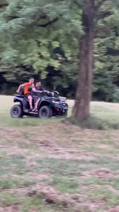 Two Guys Roll Over ATV While Riding in Open Field | Jukin Licensing