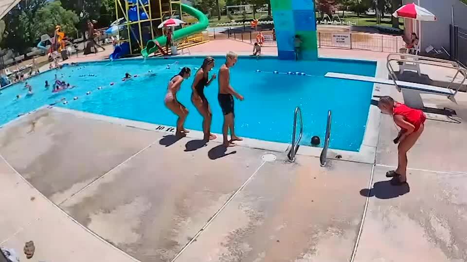 Lifeguard Falls Into Pool While Trying to Sync Swim With Coworkers ...