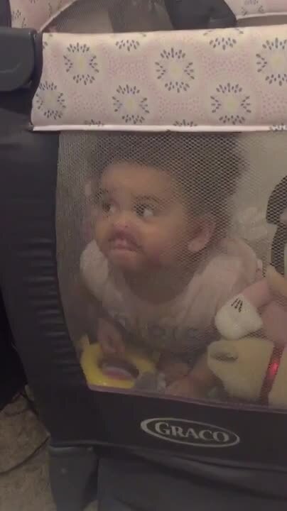 Toddler Pushes Face Against Crib Wall to Get Attention | Jukin Licensing