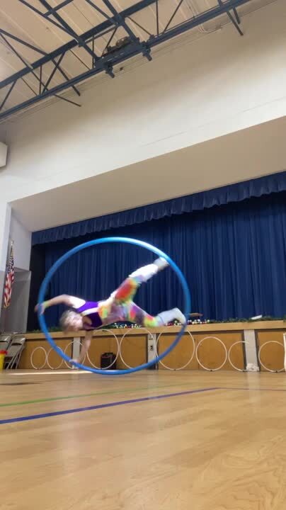 Woman Performs on Cyr Wheel in Front of School Kids Seeing It for First ...