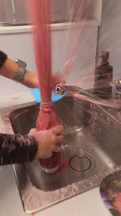 Woman Tries to Open Juice Bottle But It Explodes | Jukin Licensing