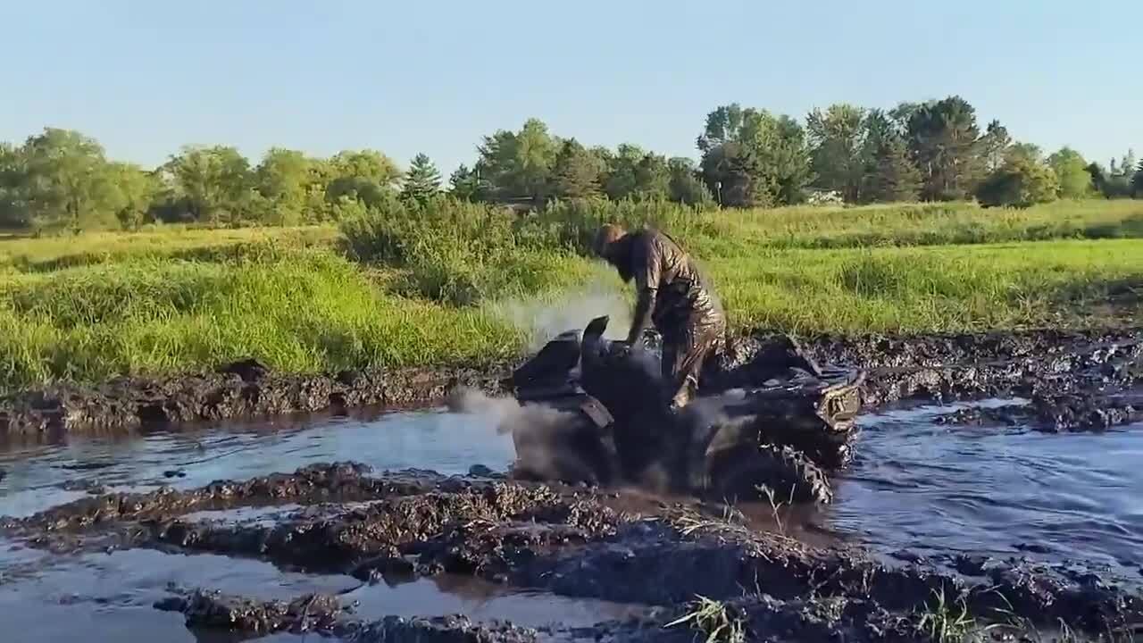 Guy Riding ATV Gets Stuck Inside Mud Pit | Jukin Licensing