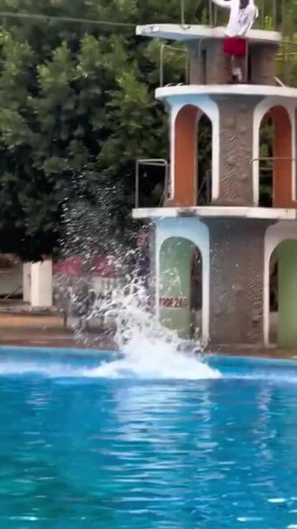 Man Falls Into Pool While Attempting to Swing Over It | Jukin Licensing