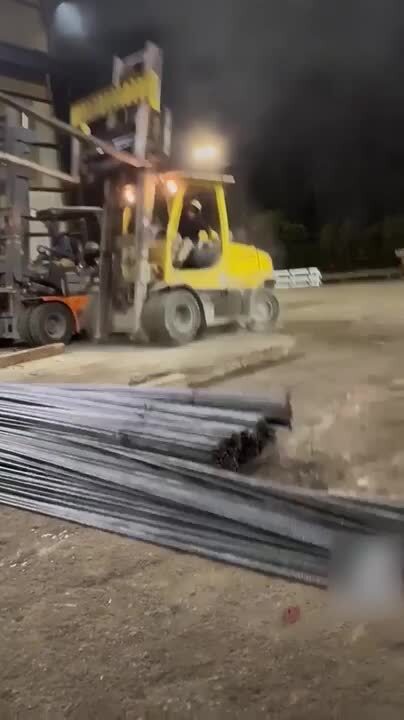 Operator Skillfully Lands Forklift Despite Its Back Lifting Off the ...
