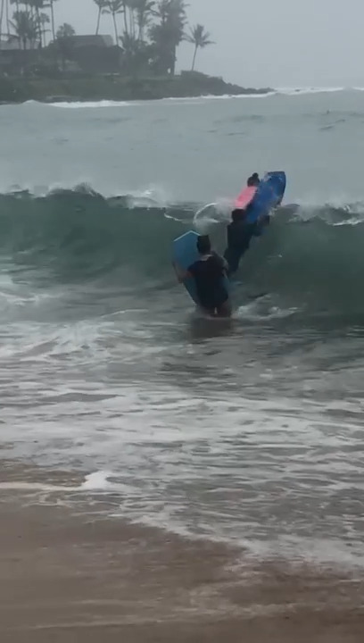 Beach Tourists Trying Boogie Boarding Gets Knocked Over by Big Waves ...
