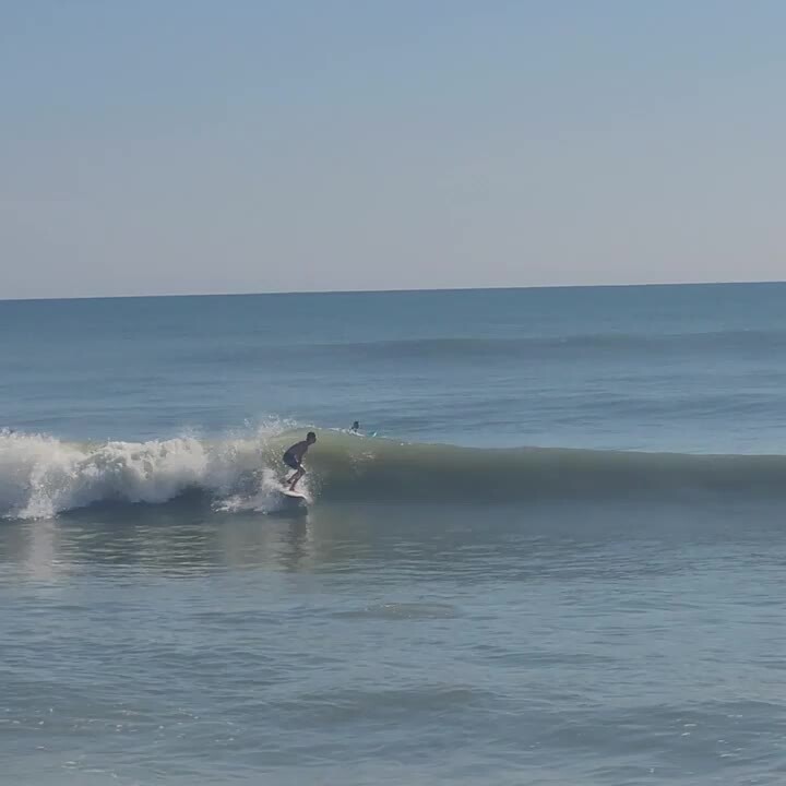 Surfer Falls Backwards into Ocean | Jukin Licensing